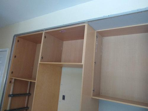 Recessed cabinets for refrigerator