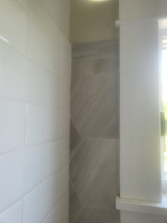 How to tile a corner where 2 types of tile meet