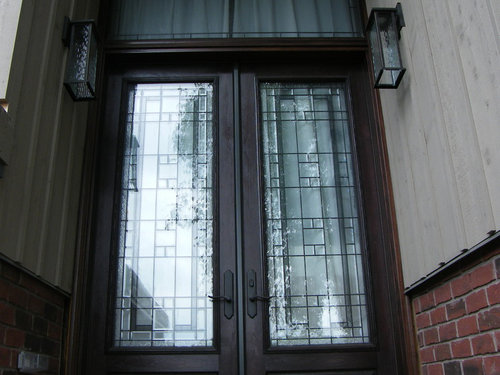 How do we finish the outside cladding around the front door?