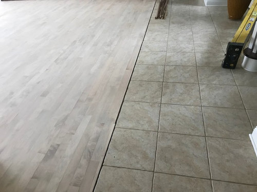 new hardwood matching old tile