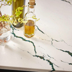 copper sink with white quartz countertop