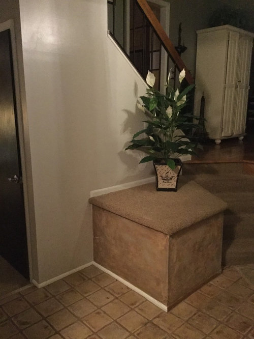 Redesign stairs to eliminate awkward landing in entry.