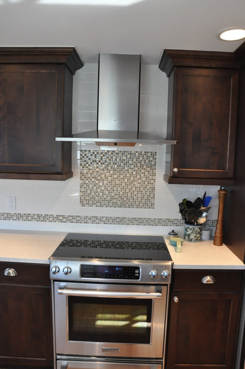 Fix a chopped up kitchen space into a dream kitchen for a family.