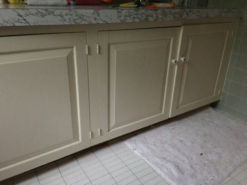 How to fix these cabinet doors?