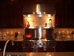 Does anyone have cutting board made to cover wolf griddle? Do you r