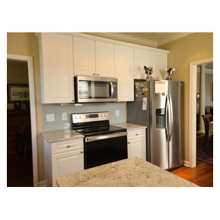 Kitchen Remodel Done with New Granite Countertop and Backsplash ...