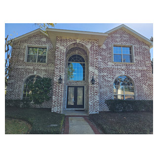 two story German smeared home - Rustic - House Exterior - Tampa - by ...