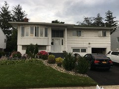 How to modernize my mid century split level house exterior?