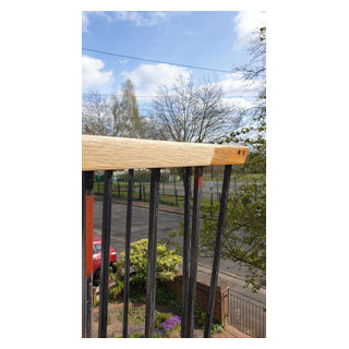 Front exterior - garage door, hand rail, and railing in West Wimbledon ...