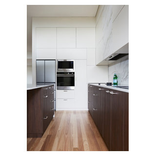 Kitchen Detail_ Oven stack, pantry, refrigerator and overhead storage ...