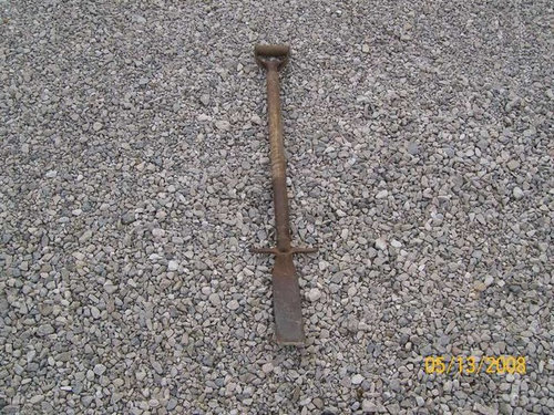 What might this old digging (?) tool be called?
