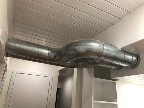 Condensation on exposed ductwork. Ideas?