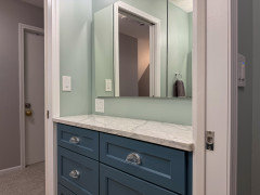 Is 44" clearance behind bathroom vanity enough to pass by?
