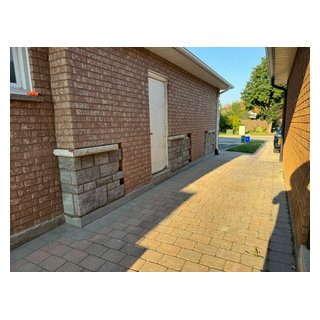 Transition of Brick To Stone Masonry Skirt With Limestone Sill ...
