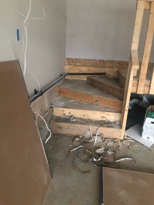 Gas pipeline along garage stairs - is this normal?