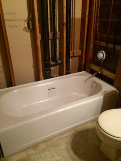 bathroom tile bowed and uneven