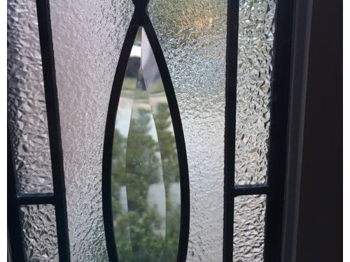 Front door glass panel