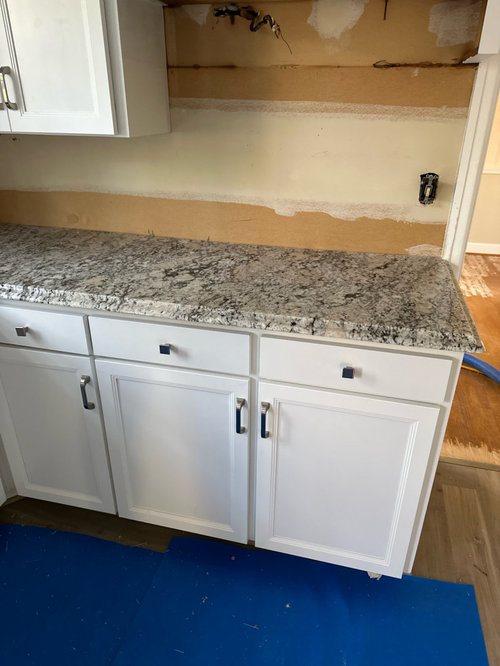 Alpine Valley countertops, off white cabinets.