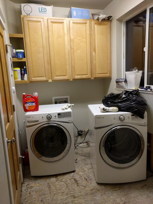 Is there any way to fix this awkward laundry room?