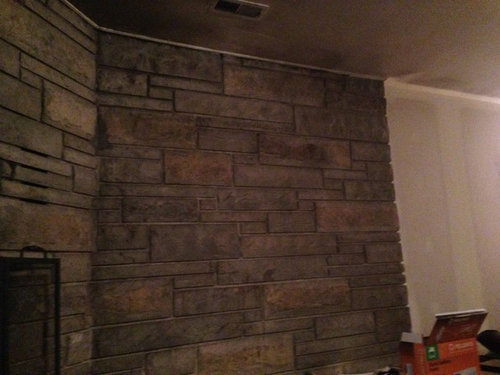 How do I clean this stone wall?