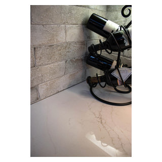 Painted Cabinetry with LaVenta Snow Drift Quartz and Travertine-Look ...