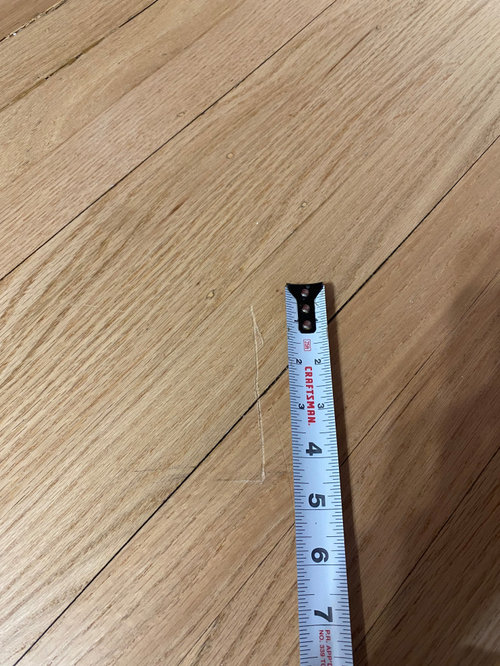 How to fix wood floor scratch?