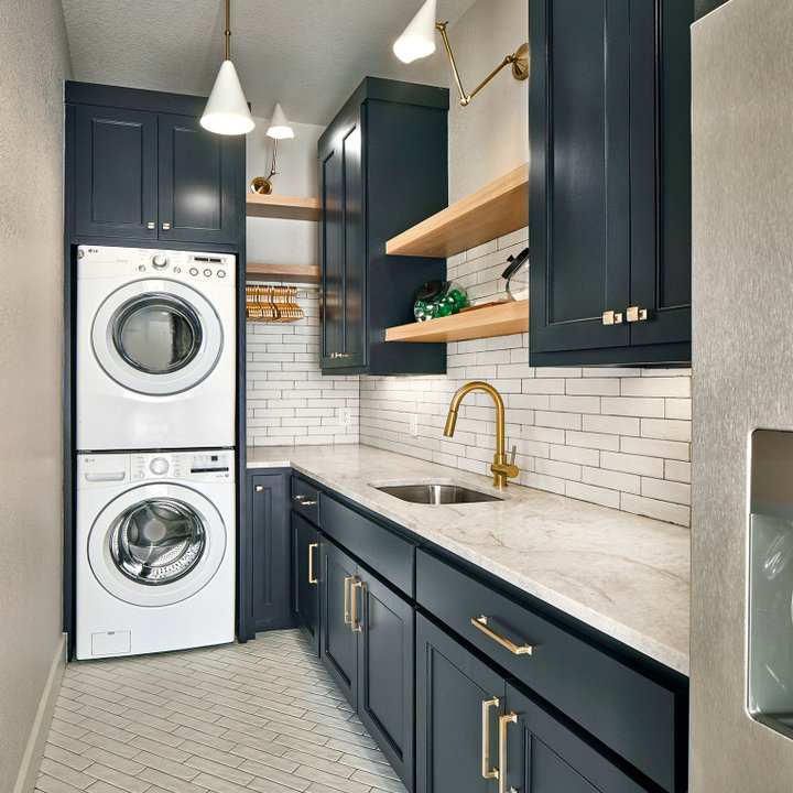 75 Beautiful Utility Room with a Stacked Washer and Dryer Ideas and ...