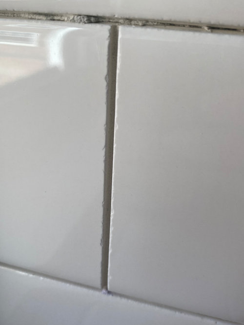 Bathroom tiles - How to avoid rough edge cuts?