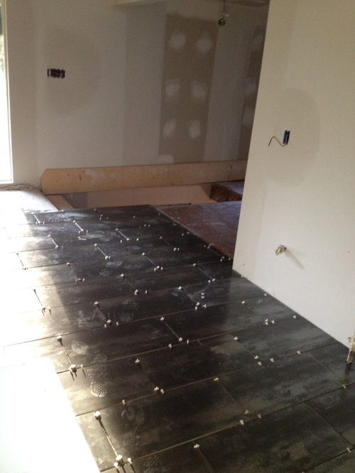 Which way should rectangular tiles run in smaller rectangular halls an