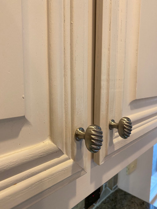 How to modernize a kitchen with stone arch over stove?