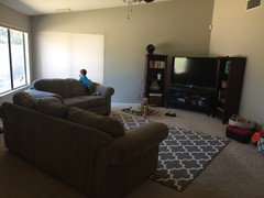 Off center couch in front of window -help?