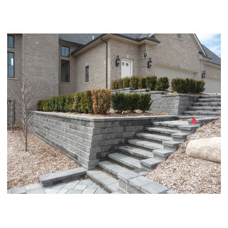Tiered Unilock Pisa Retaining Walls with a Staircase & Paver Landings ...