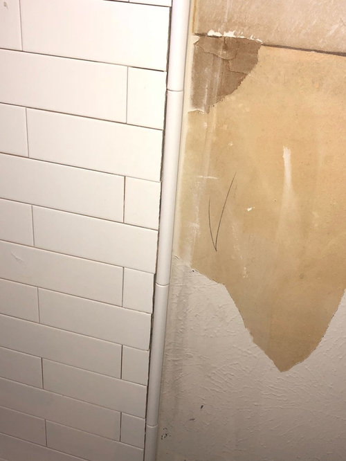 Help! How poor did my tile installer do??