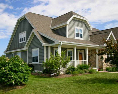 Green Exterior Design Ideas, Renovations & Photos with a Clipped Gable Roof