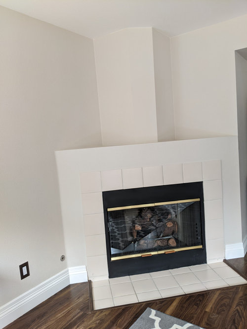 How would you update this corner fireplace?