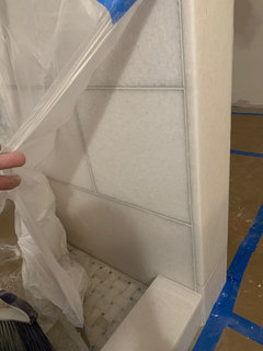 Grout bleeding into marble tiles