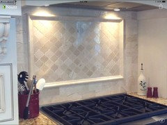 Backsplash and framed focal point above range
