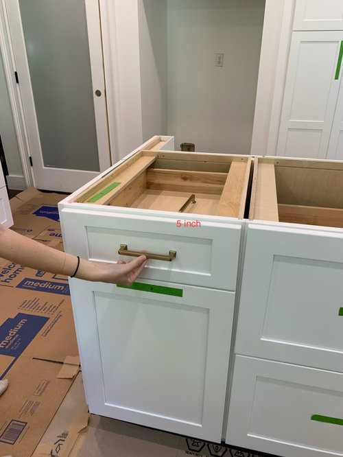 Help me choose pull size for pull out trash cabinet, 5 or 7"?