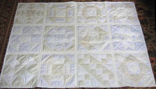 All cream and white quilt