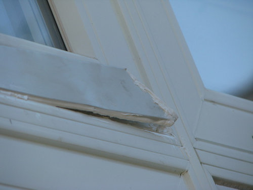 Need help!! Bad Contractor job on vinyl window hail damage