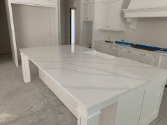 Daltile quartz- Independence Calacatta or Valor White?