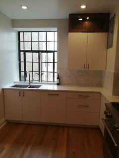 How do you lay out counter top when kitchen window is lower than sink?