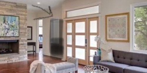 front door opens in middle of living room-move front door?