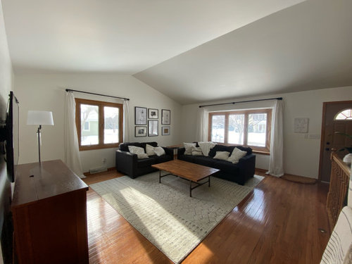 Couch off center of window