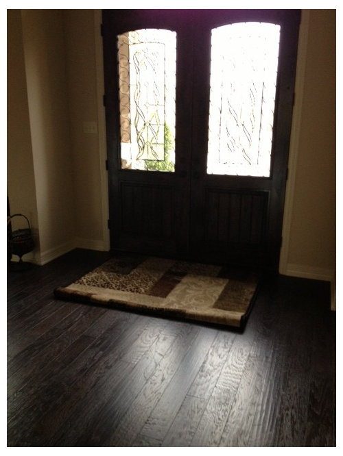 Need advice on which rug size to go with in our entryway/foyer.