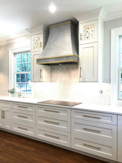 quartzite wrapped range hood?