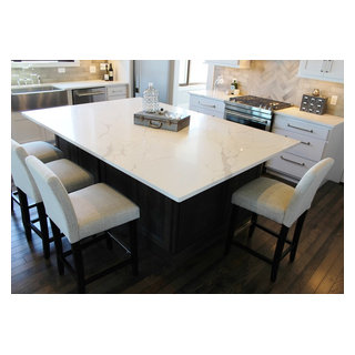 Applestone Homes of Quad Cities White Kitchen With Gray Island ...