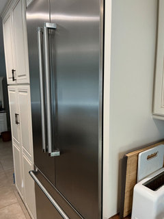 help- how to place a counter depth refrigerator?