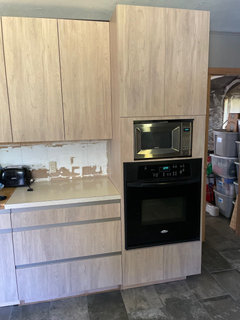 Infill gap ideas for spaces around cabinets tween walls and ceiling?