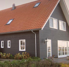 siding to match a maroon metal roof